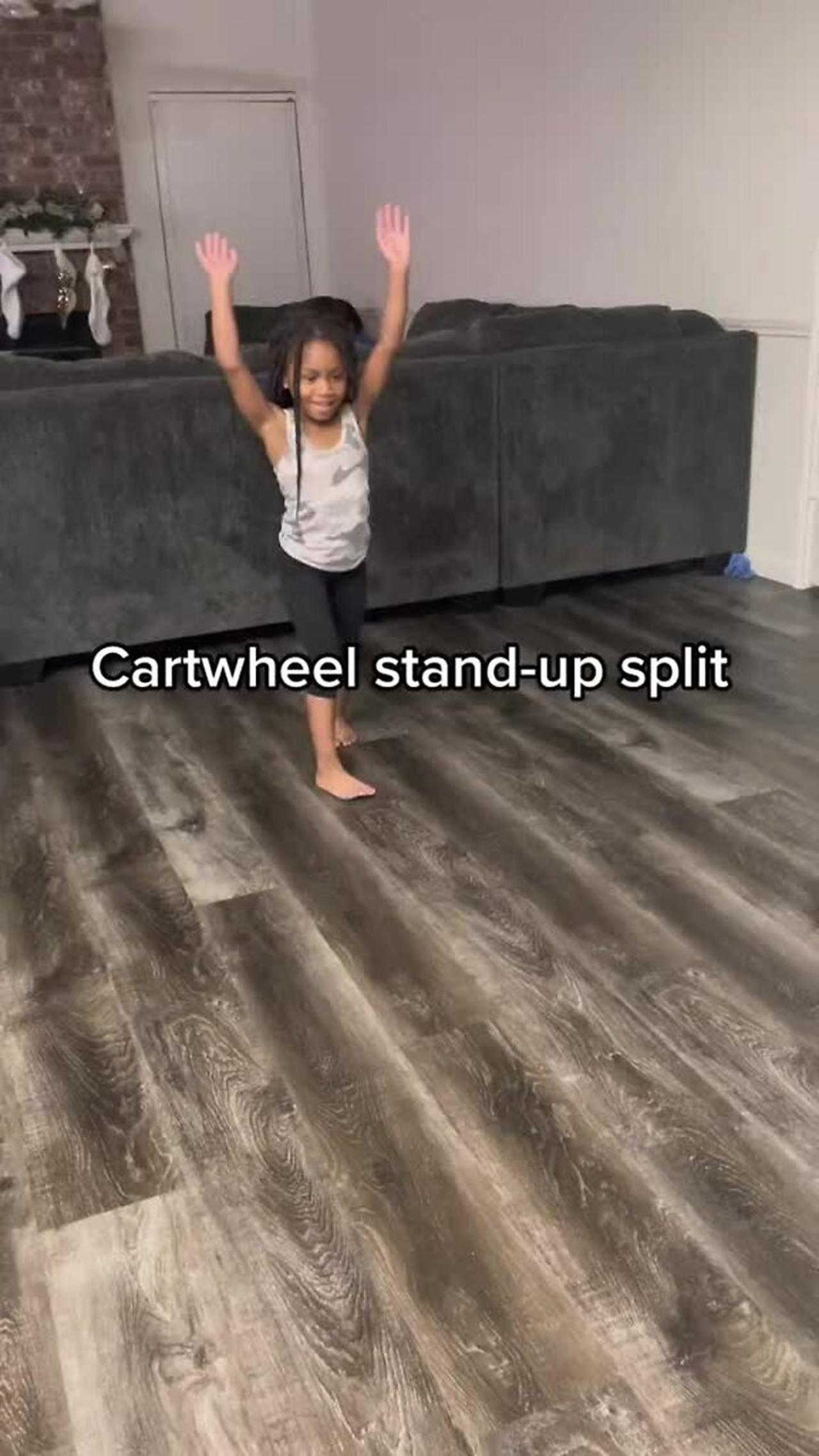 Little girl is trying to do a front walk over - One News Page VIDEO