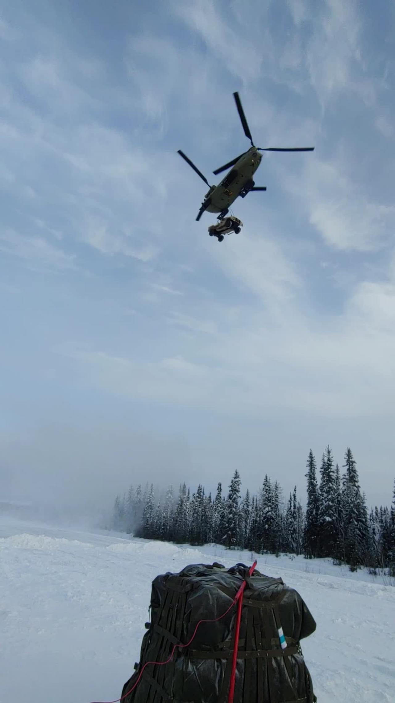 Arctic sling load operations (Army JLTV) flyover - One News Page VIDEO