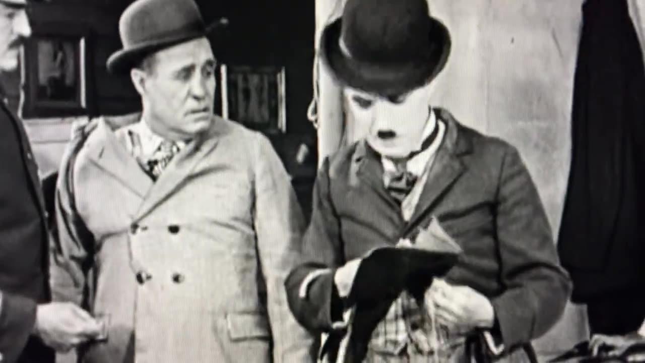 Charlie Chaplin stealing "candy" from - One News Page VIDEO