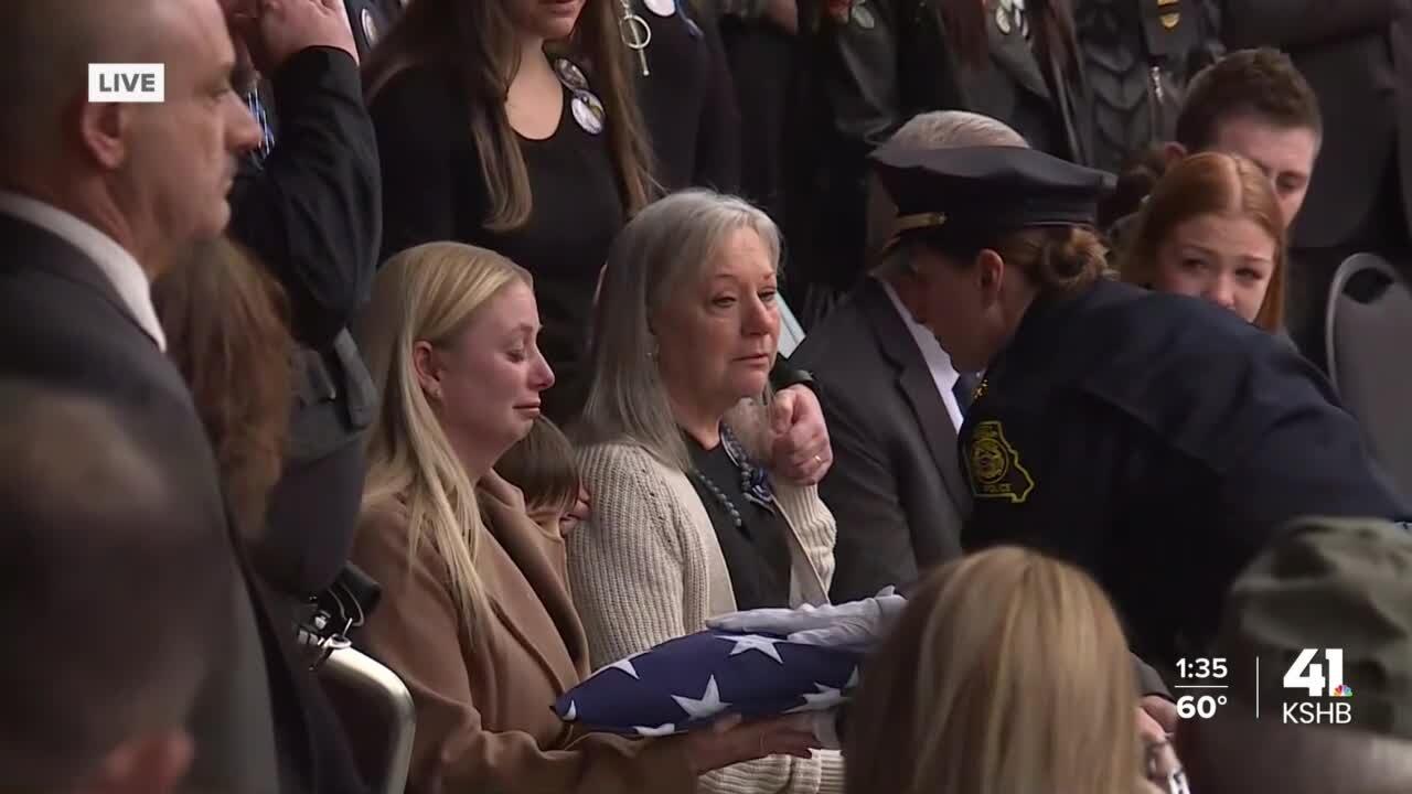 KCPD Officer James Muhlbauer's wife, son - One News Page VIDEO