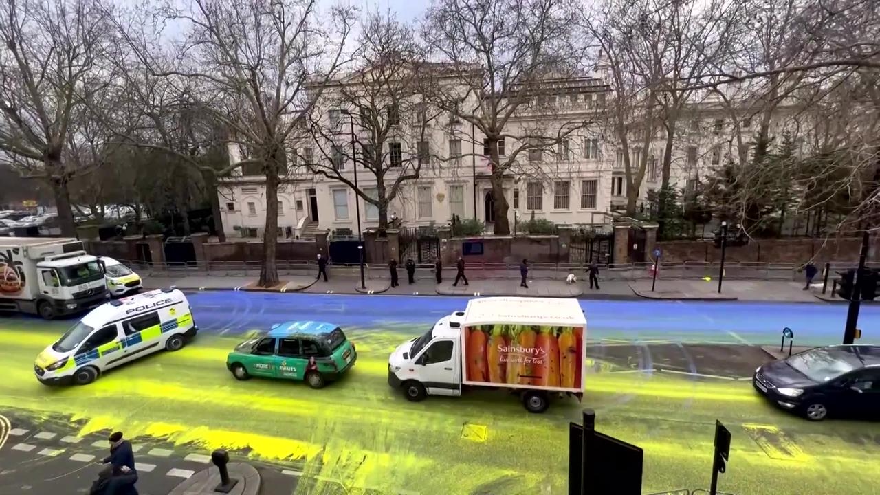 Huge Ukraine flag painted outside Russian - One News Page VIDEO