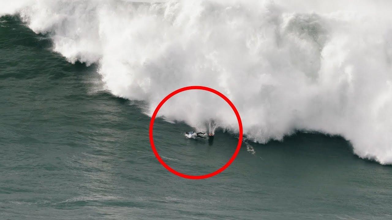 Surfer washed away by a huge wave - One News Page VIDEO