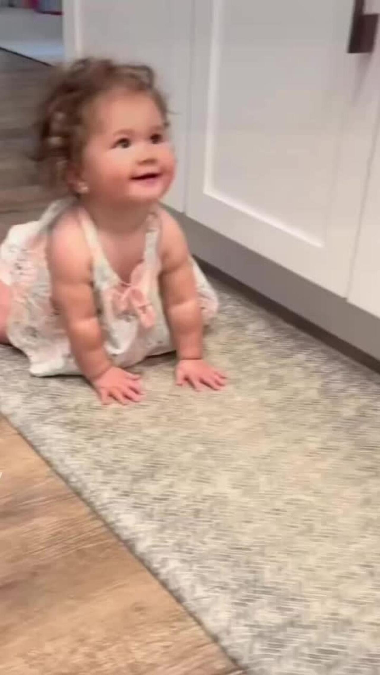 Cute baby tumbles backward while parent is - One News Page VIDEO