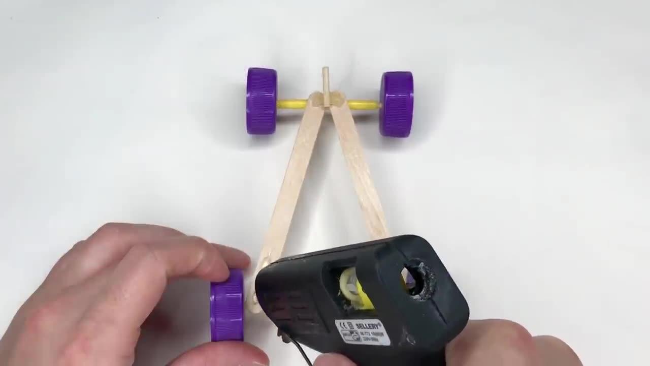 How to make ha mini Rubber band Car - One News Page VIDEO