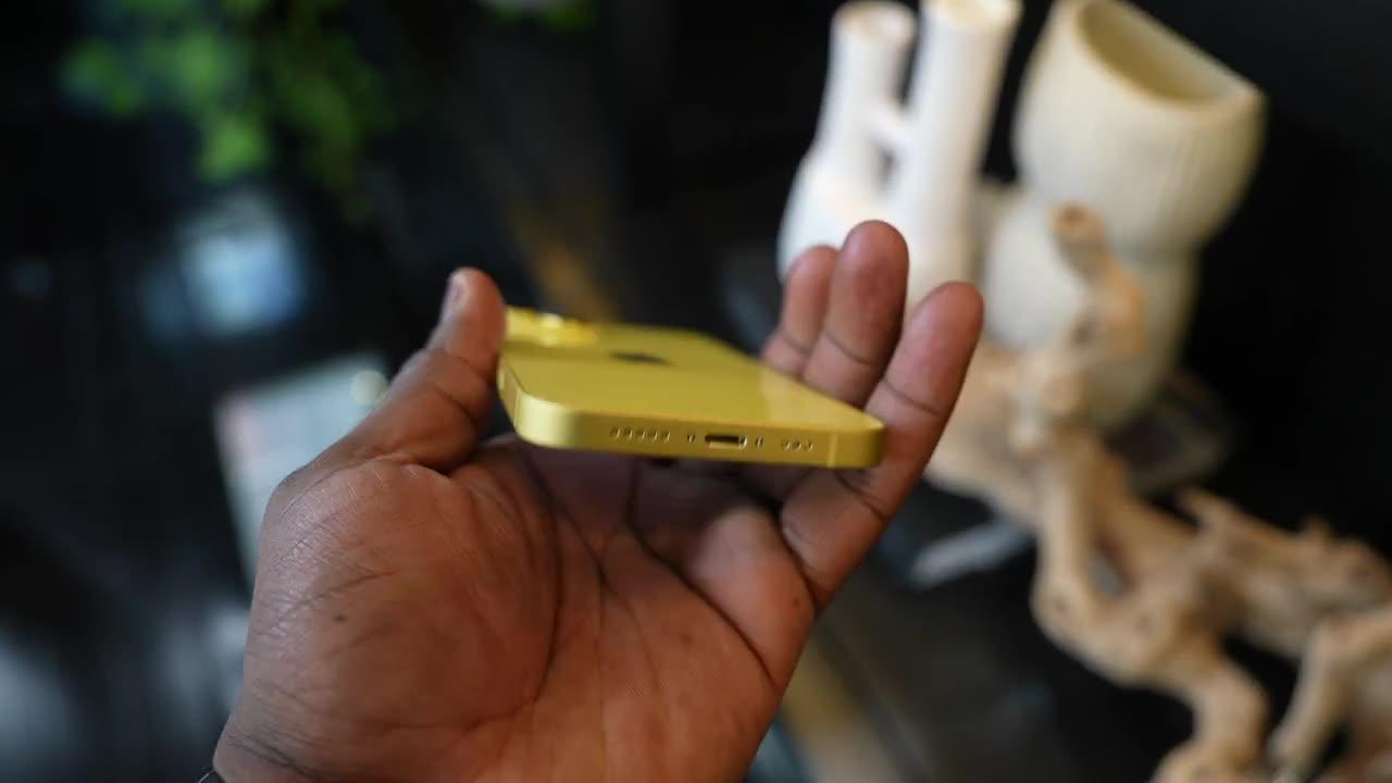Impressions after unboxing the yellow iPhone 14 - One News Page VIDEO