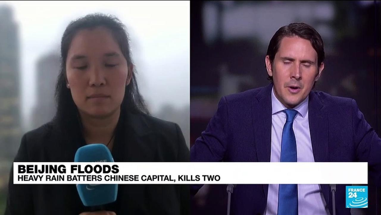 Beijing on alert as heavy rain batters north - One News Page VIDEO