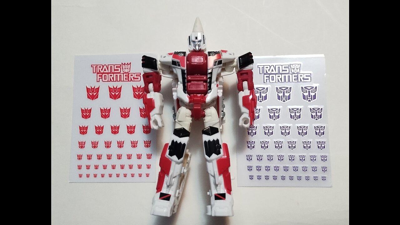 Transformers Shattered Glass Faction Symbols - One News Page VIDEO