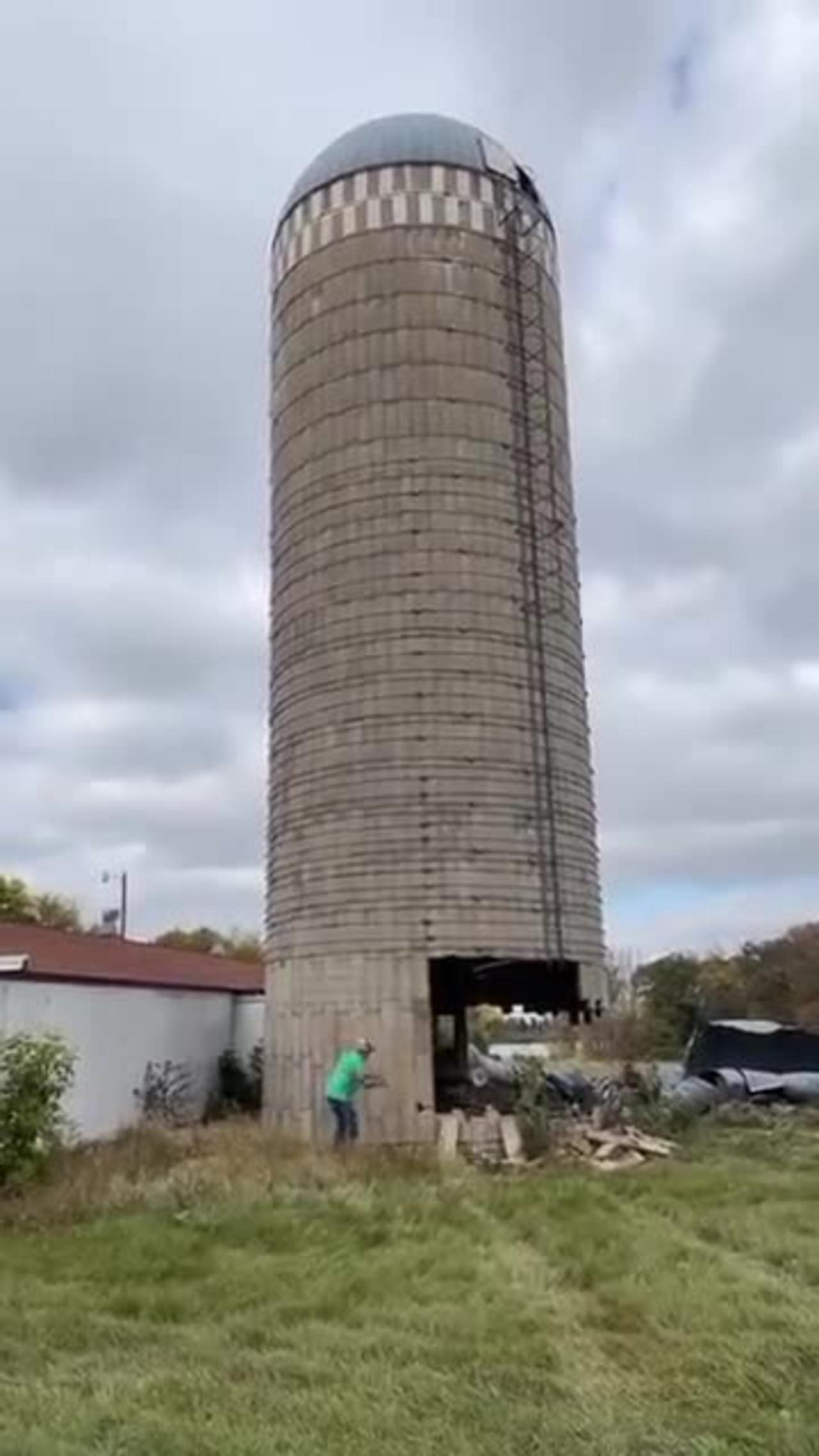 Taking down silo with sledgehammer - One News Page VIDEO