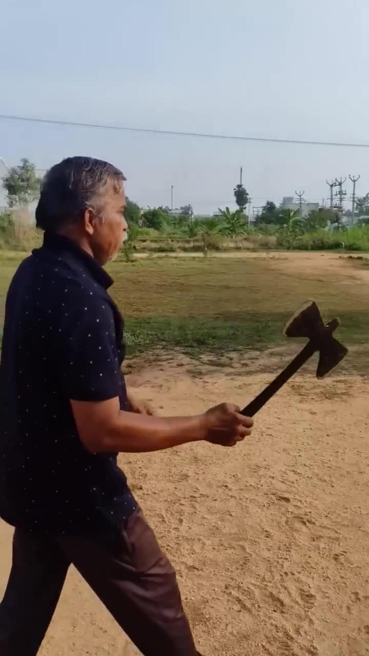 Father and Son Throwing in Axe type Valari-Vjm - One News Page VIDEO