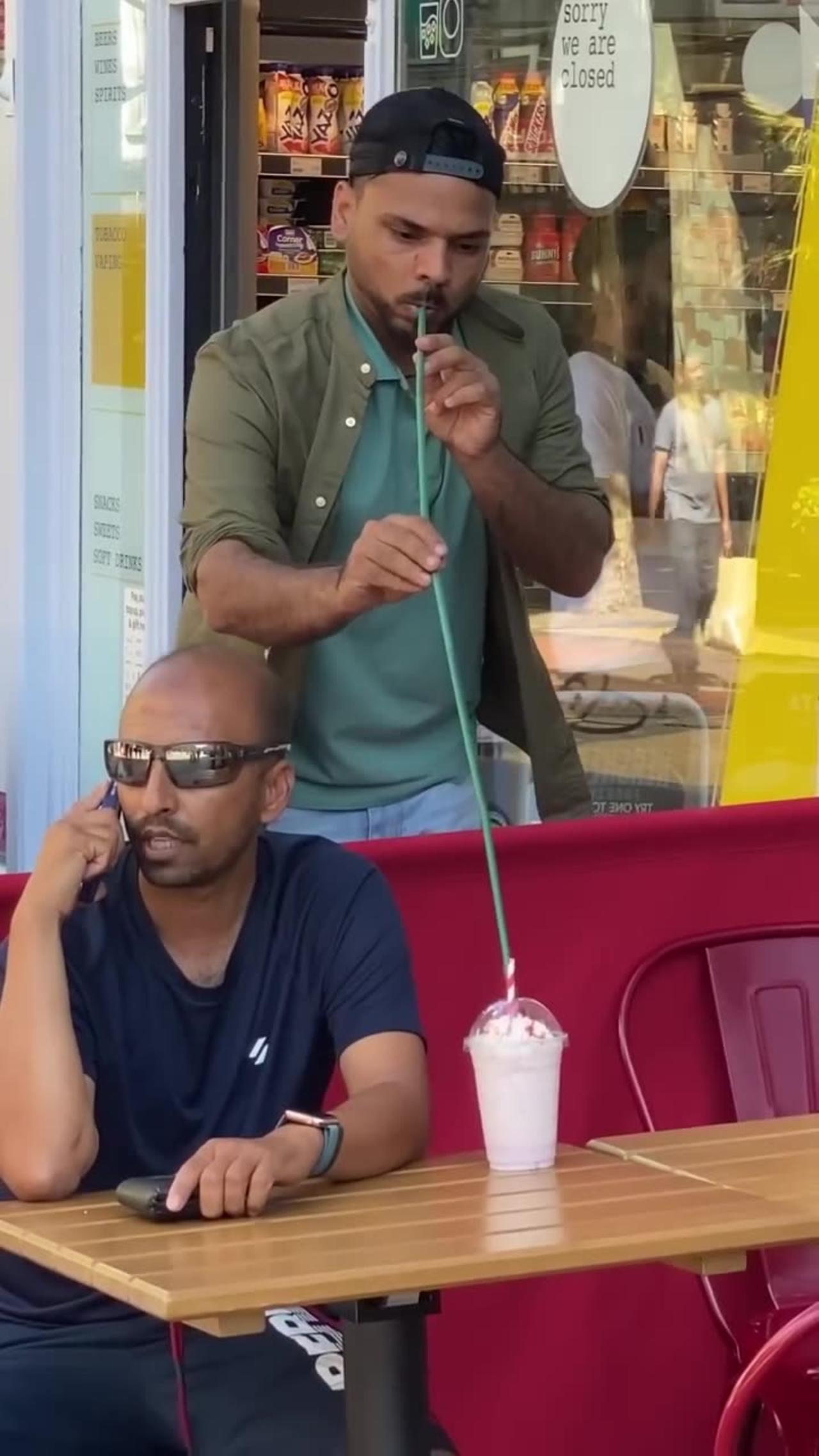 Long straw drinking stranger shake - One News Page VIDEO