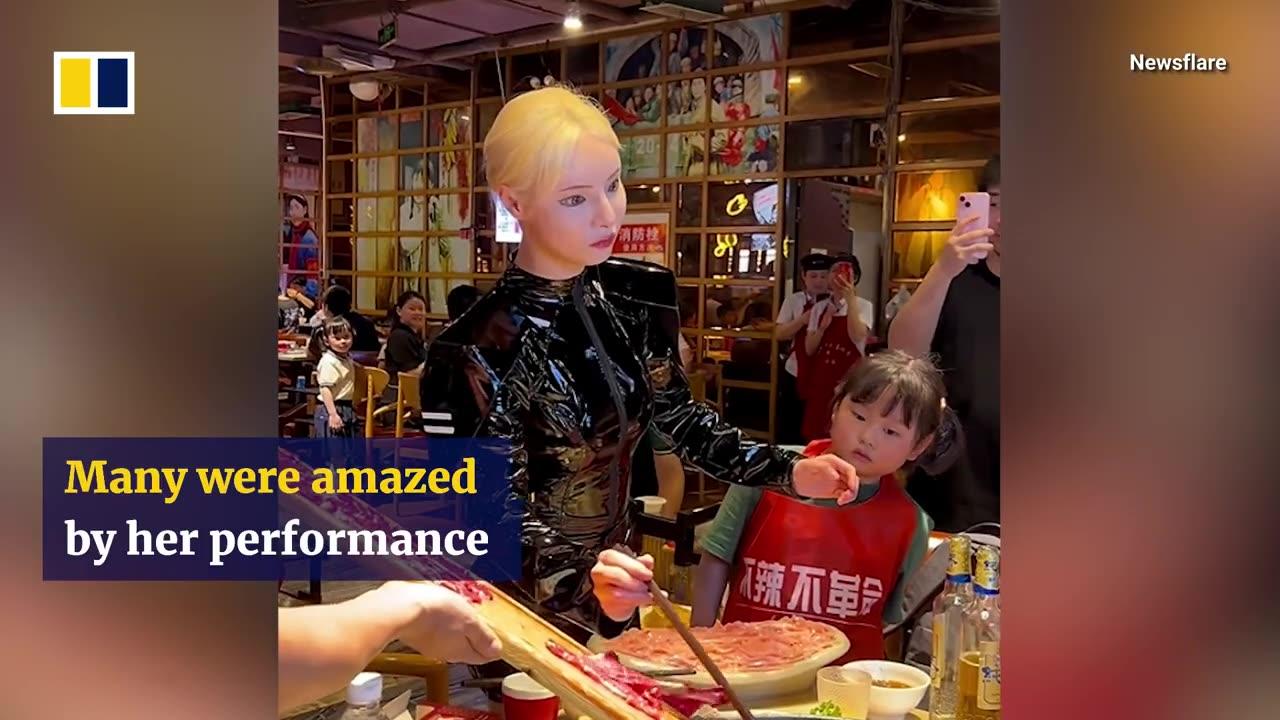 Robot-dancing waitress shocks diners in - One News Page VIDEO